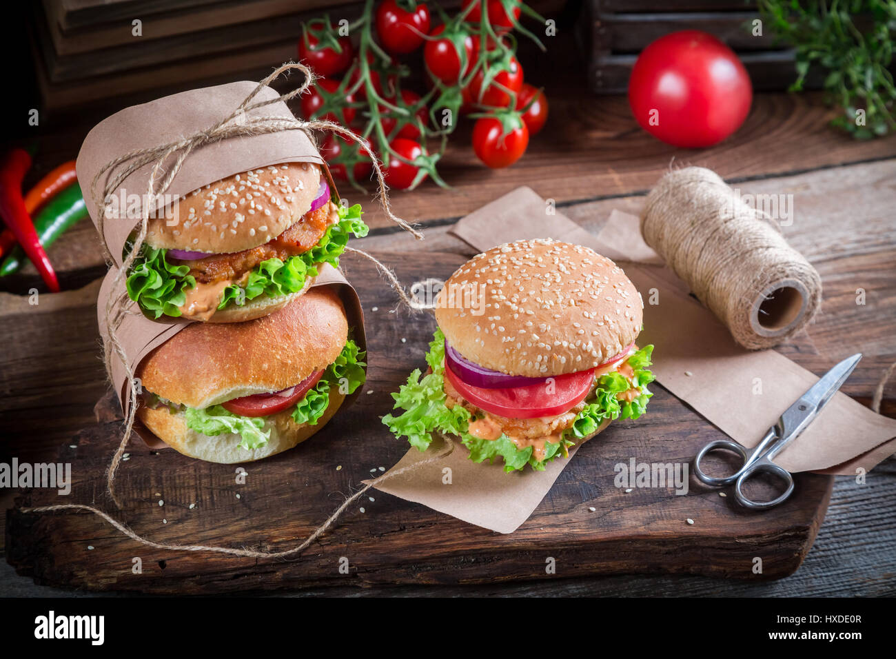 Homemade takeaway hamburger with fresh vegetables Stock Photo - Alamy