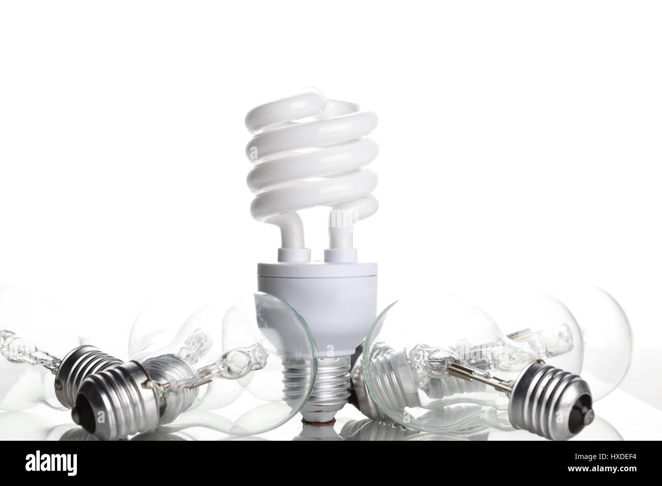 standing fluorescent light bulb with normal light bulb around it Stock ...