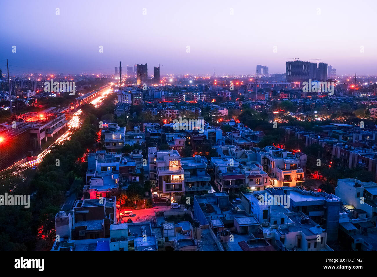 Noida cityscape at night with lights on the buildings and the ...