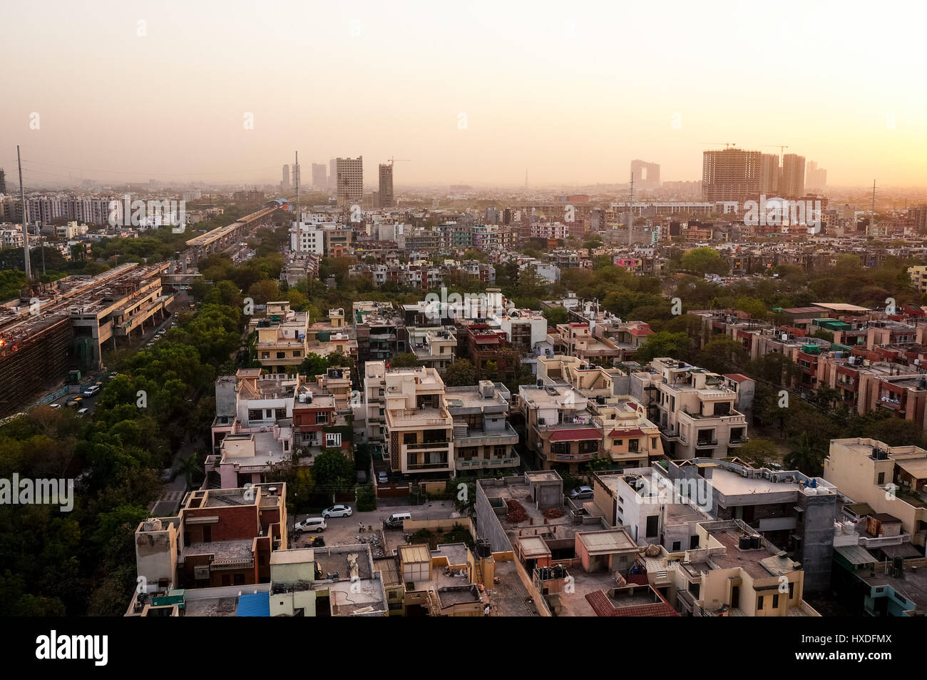 Noida cityscape at dusk with the under construction buildings and ...
