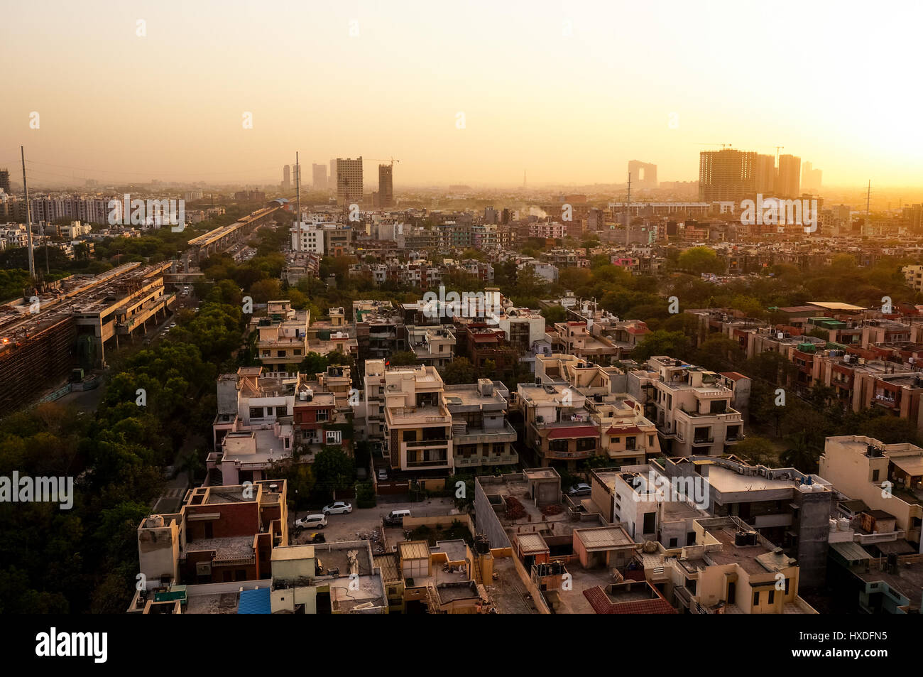Noida cityscape at dusk with the under construction buildings and ...