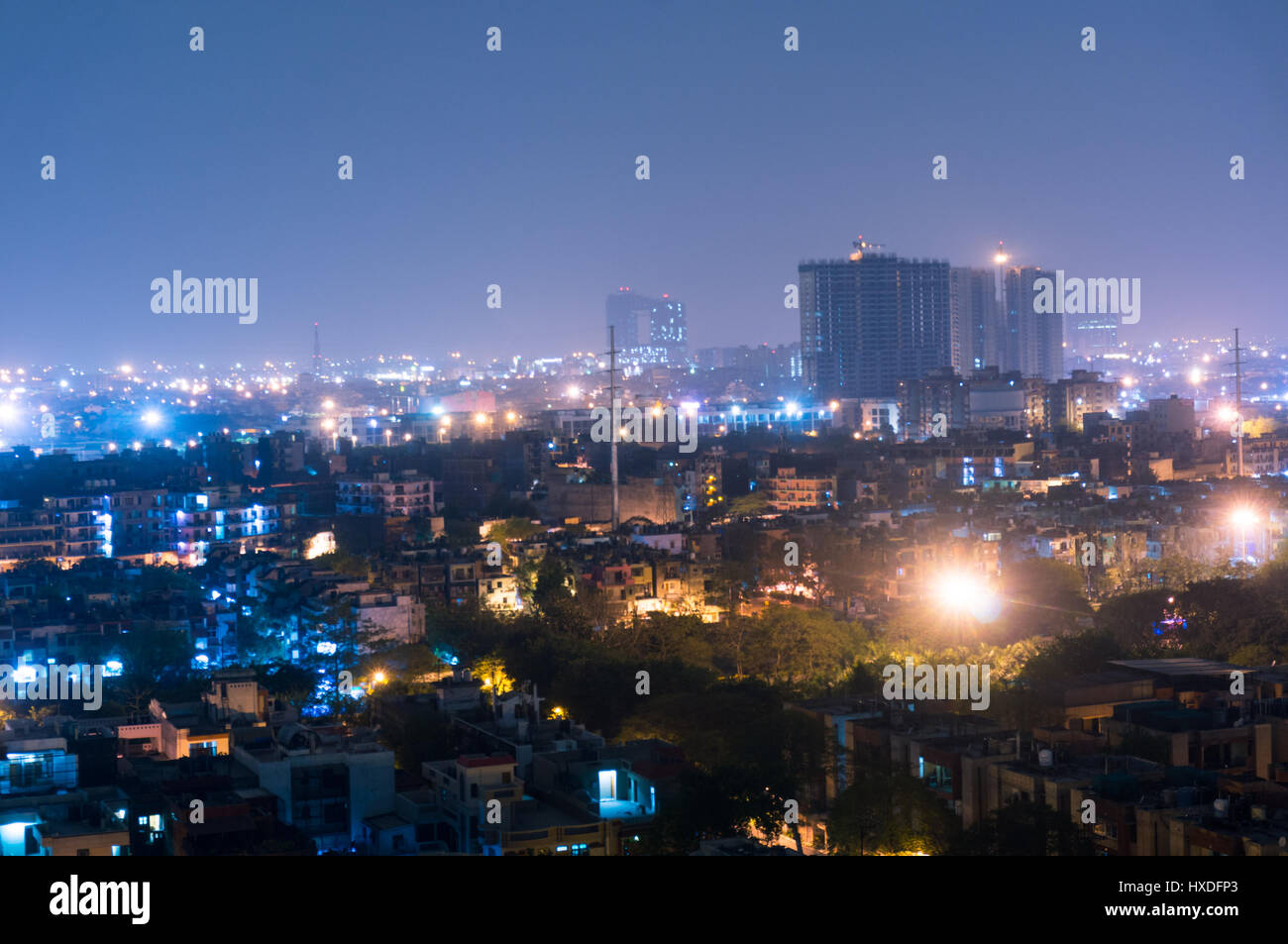 Cityscape of Noida Delhi at night with lights and under construction ...