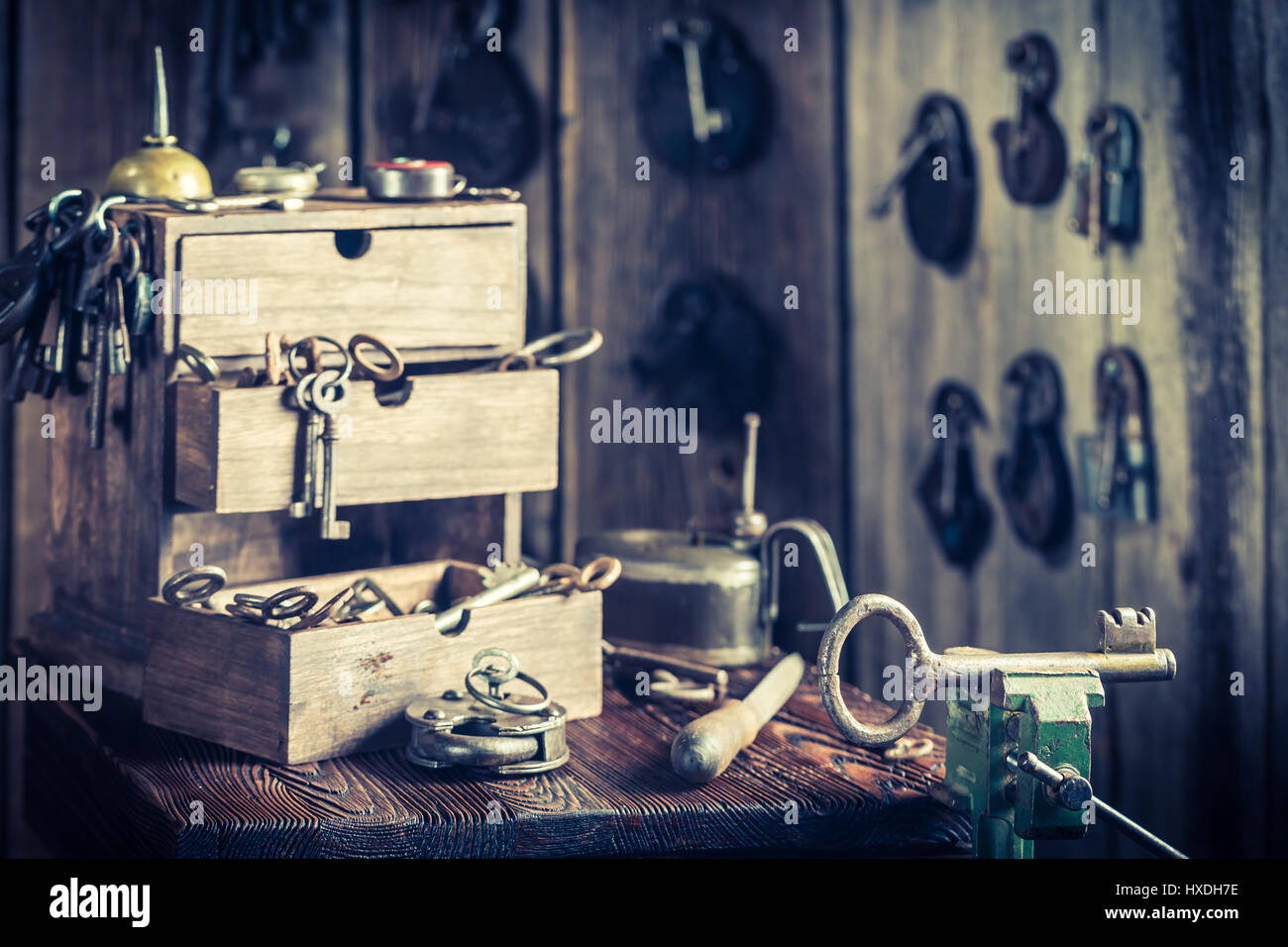 Locksmiths workshop with keys and locks Stock Photo - Alamy