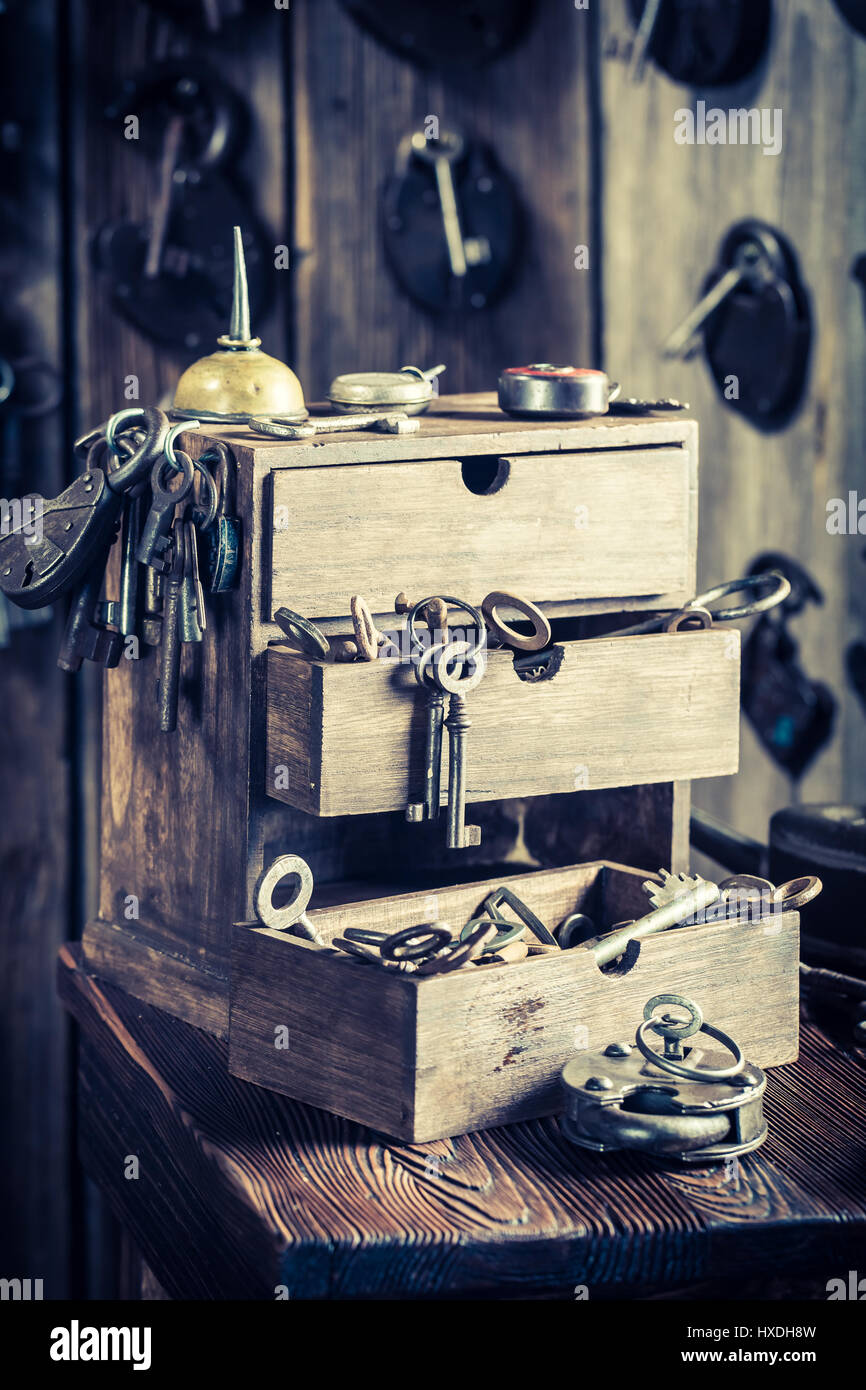 Vintage locksmiths workshop with ancient tools Stock Photo - Alamy