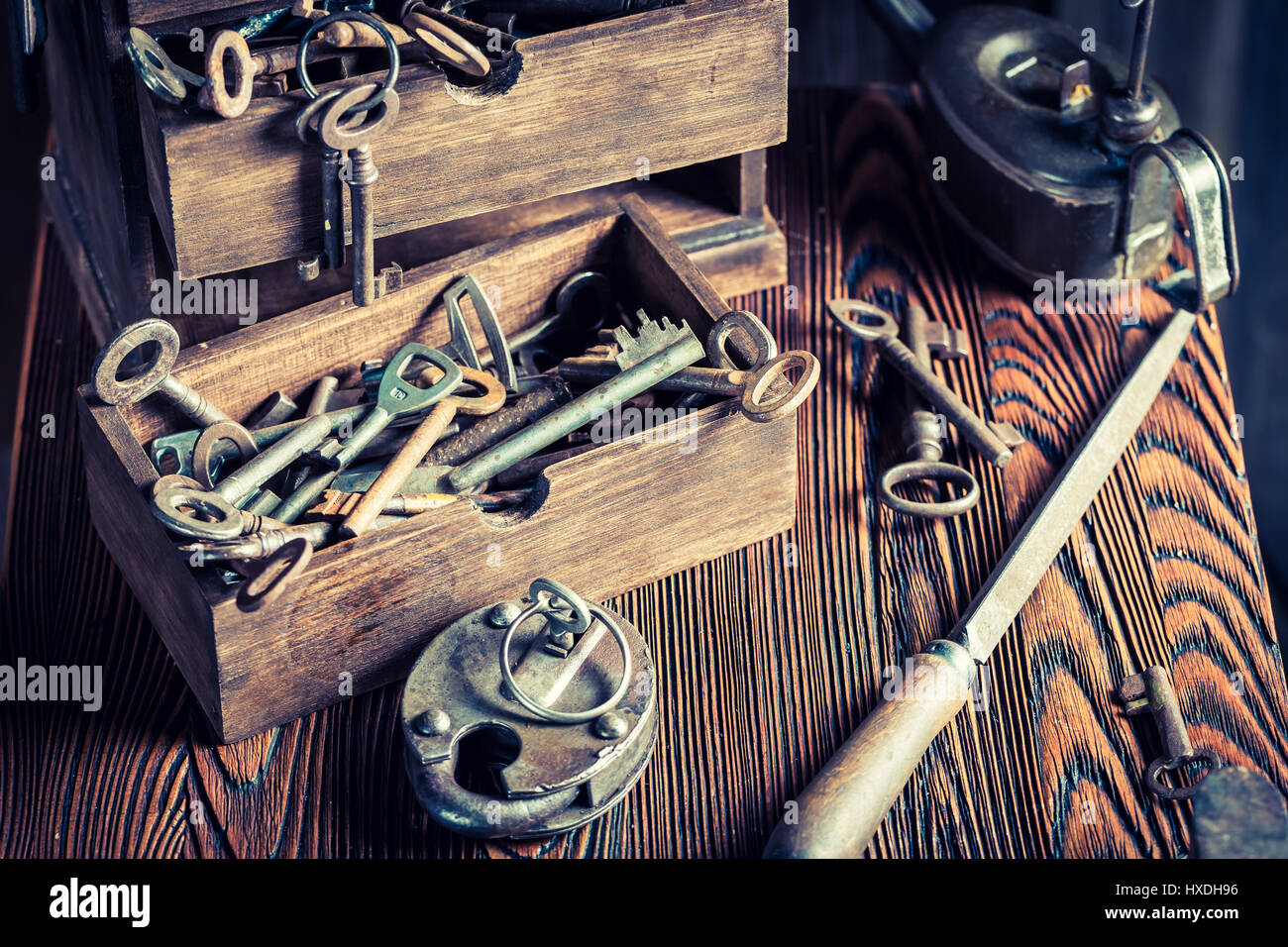 Old locksmiths workshop with tools, locks and keys Stock Photo - Alamy
