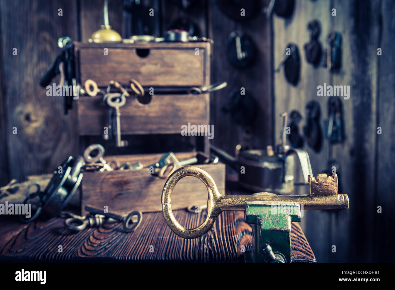 Aged locksmiths workshop with tools, locks and keys Stock Photo - Alamy