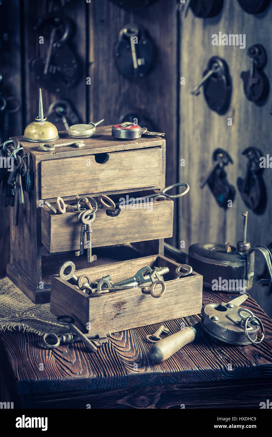 Aged locksmiths workshop with ancient tools Stock Photo - Alamy