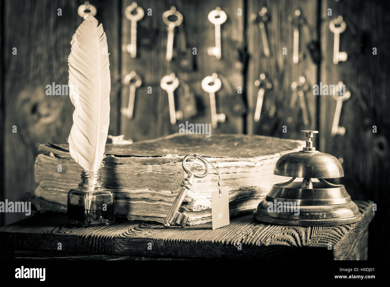 Old front desk in hotel with keys for rooms and guestbook Stock Photo ...