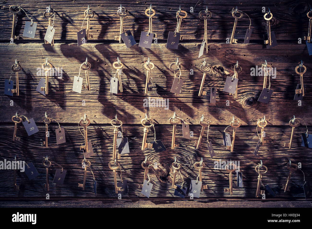 Vintage keys for hotel rooms Stock Photo - Alamy