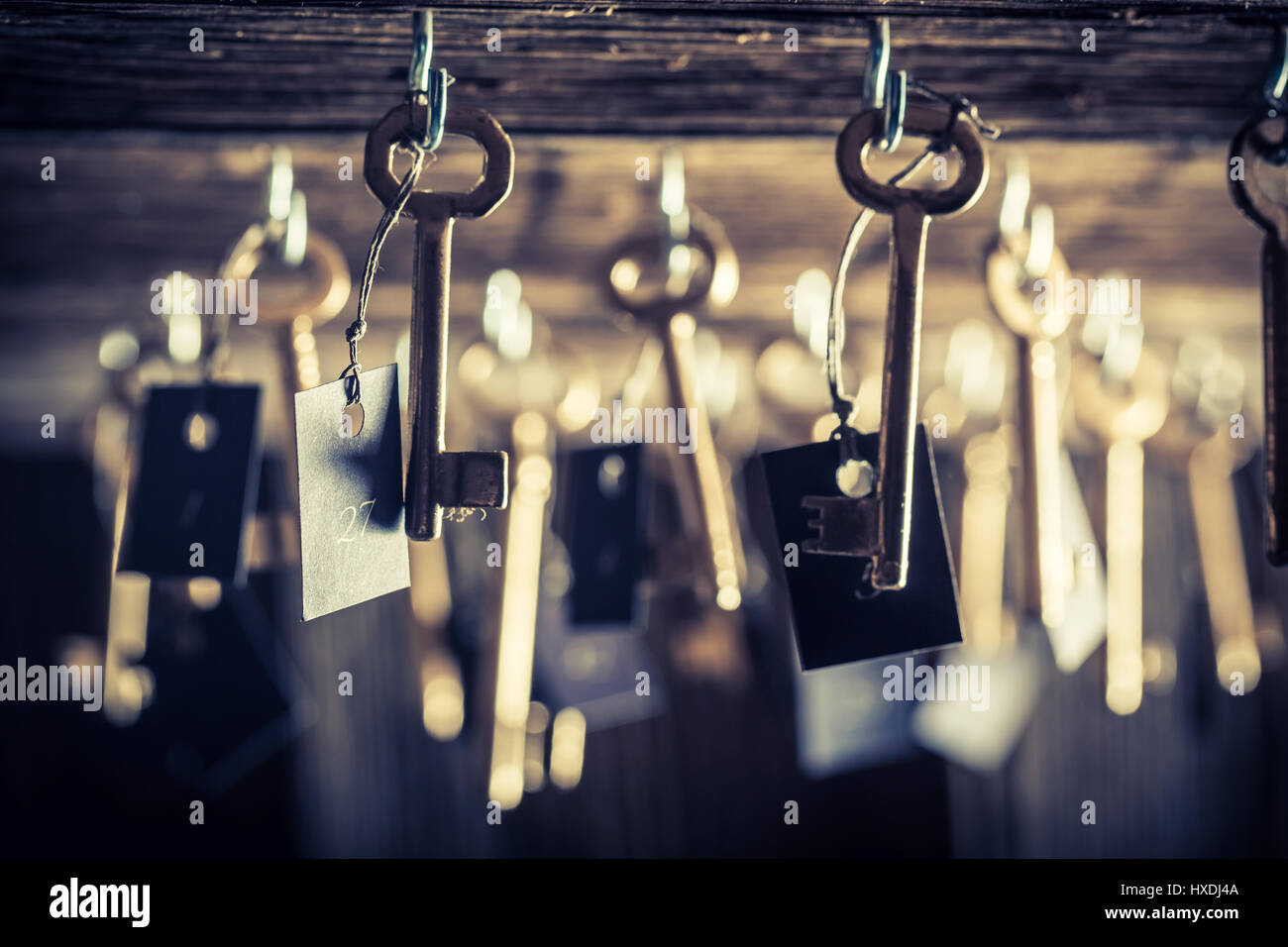 Aged keys for hotel rooms Stock Photo - Alamy