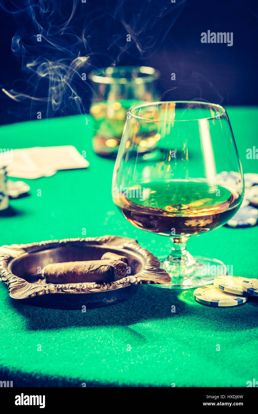 Vintage gambling table with cards and chips Stock Photo - Alamy