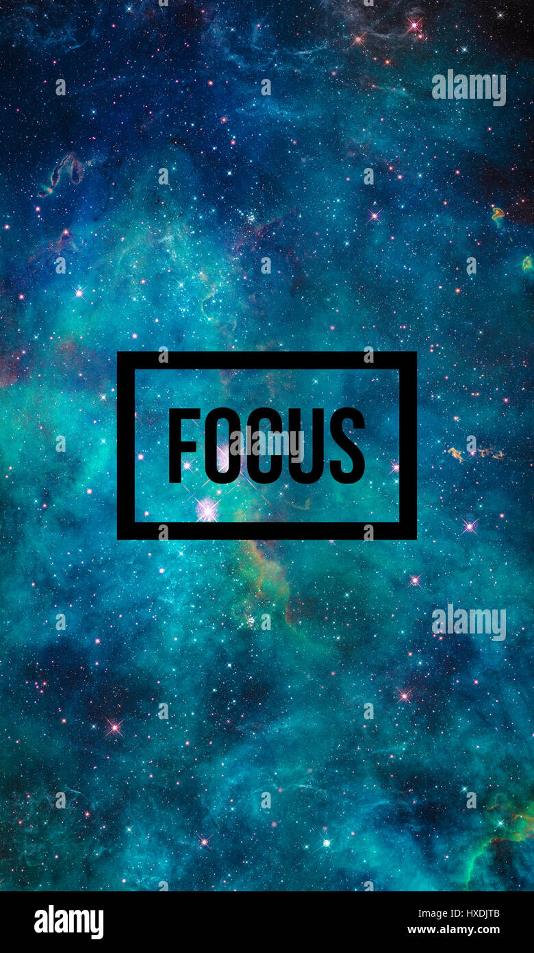Focus motivational quote on night starry sky background Stock Photo - Alamy