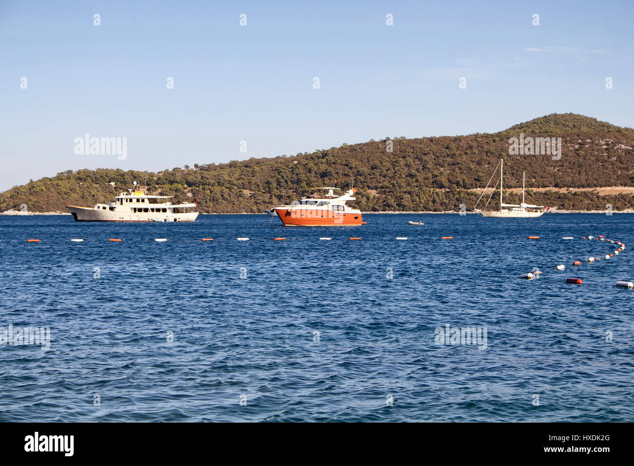 Luxury yachts parked in Turkbuku bay in Bodrum peninsula Stock Photo ...
