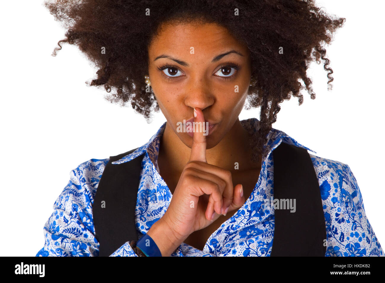 Young afro american saying shhh- be quiet - isolated on white ...