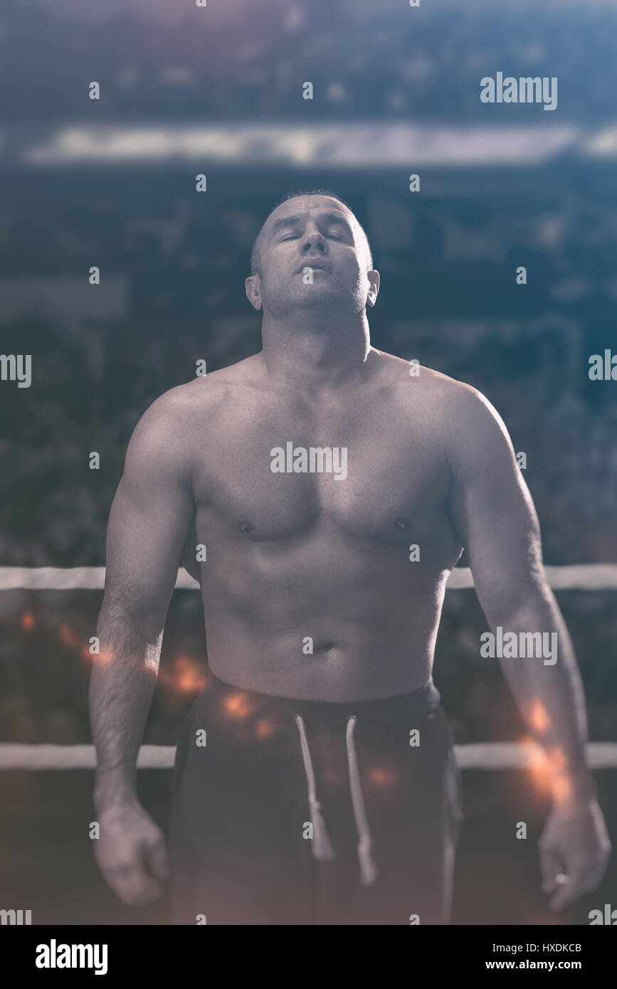 professional kickboxer with hands in martial arts position training for ...