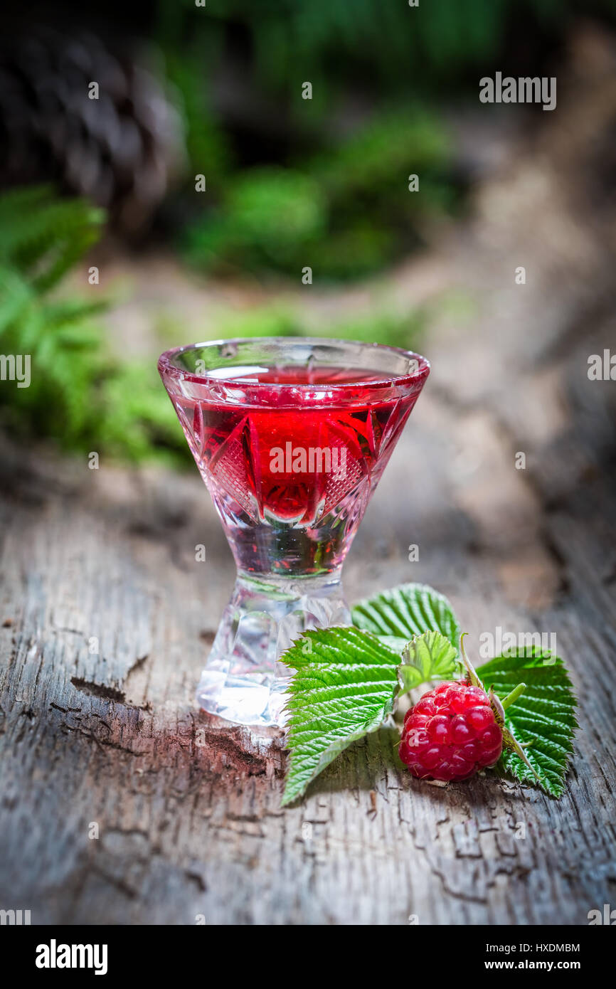 Tasty raspberries liqueur made of fruits and alcohol Stock Photo - Alamy