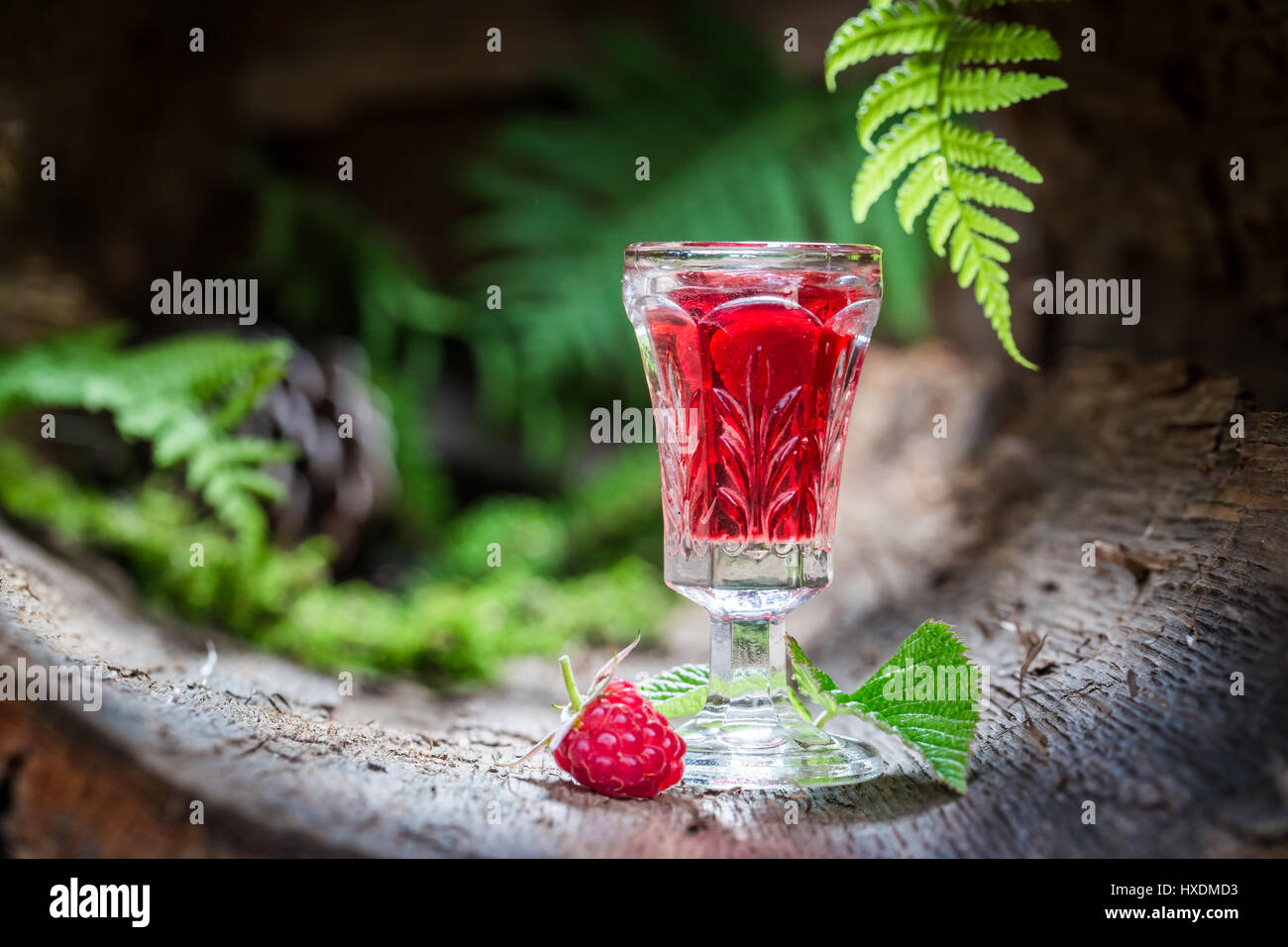 Healthy raspberries liqueur made of fruits and alcohol Stock Photo - Alamy