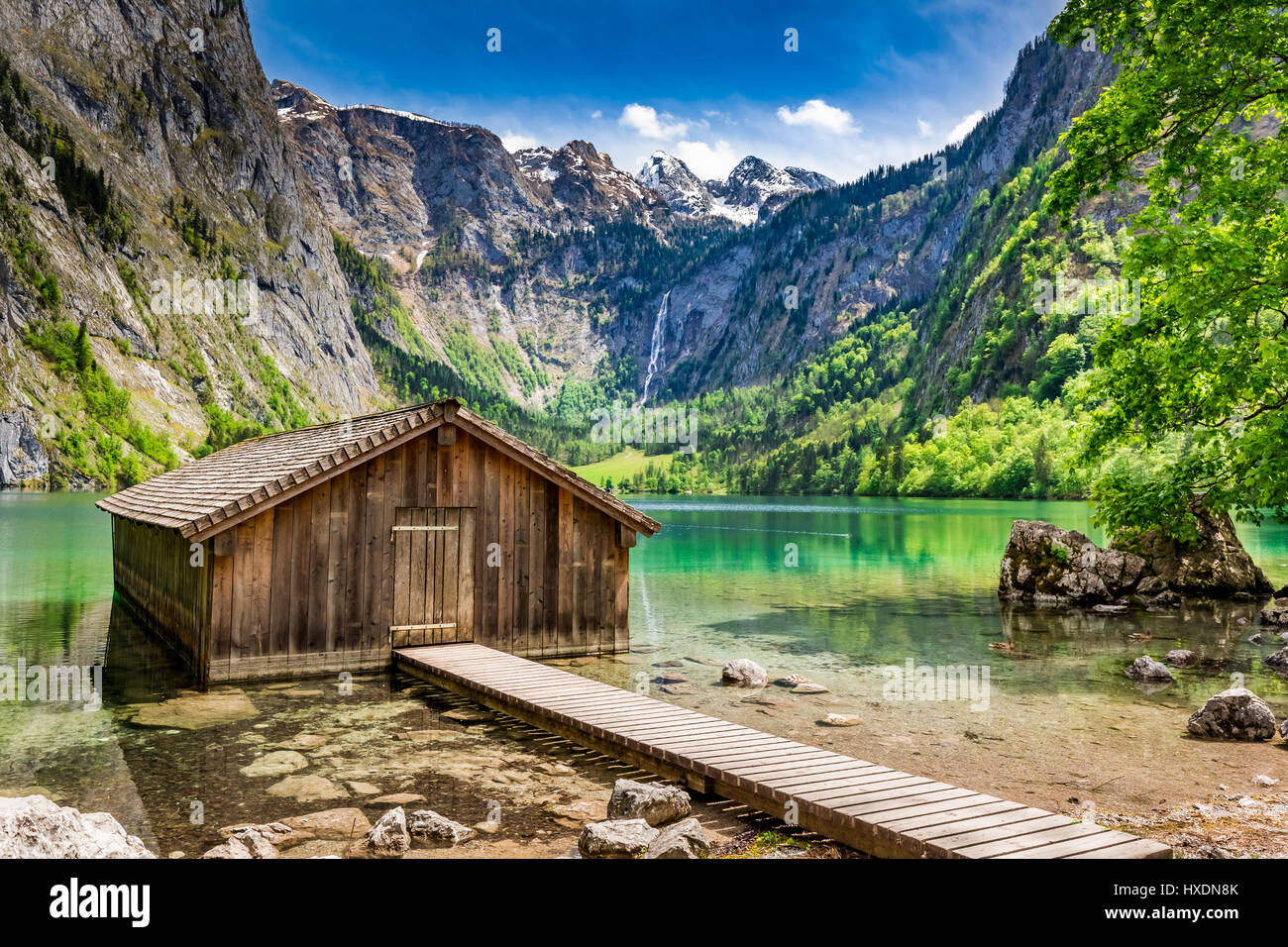 Small wooden cabin at the Obersee lake in German Alps Stock Photo - Alamy