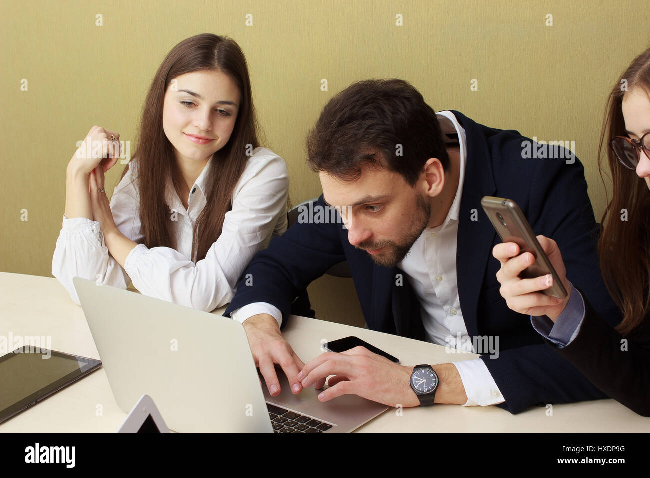 Business - team meeting in an office with laptop, boss with his ...
