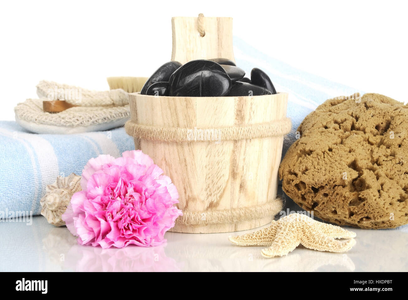 Carnation blossom, bath utensils and stones, Nelkenbluete ...