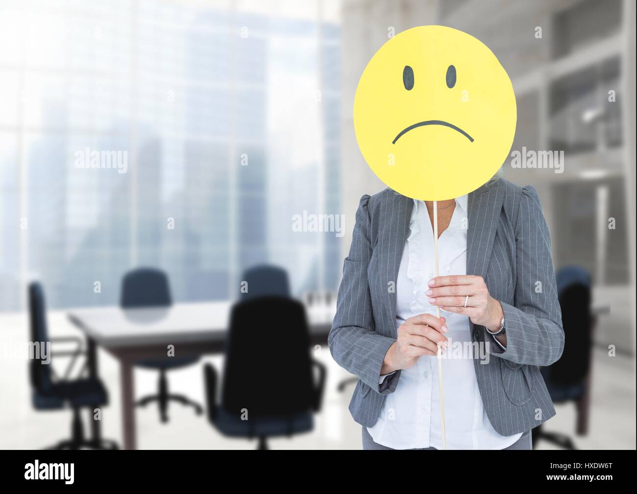 Digital composite of Sad businesswoman against office meeting room ...