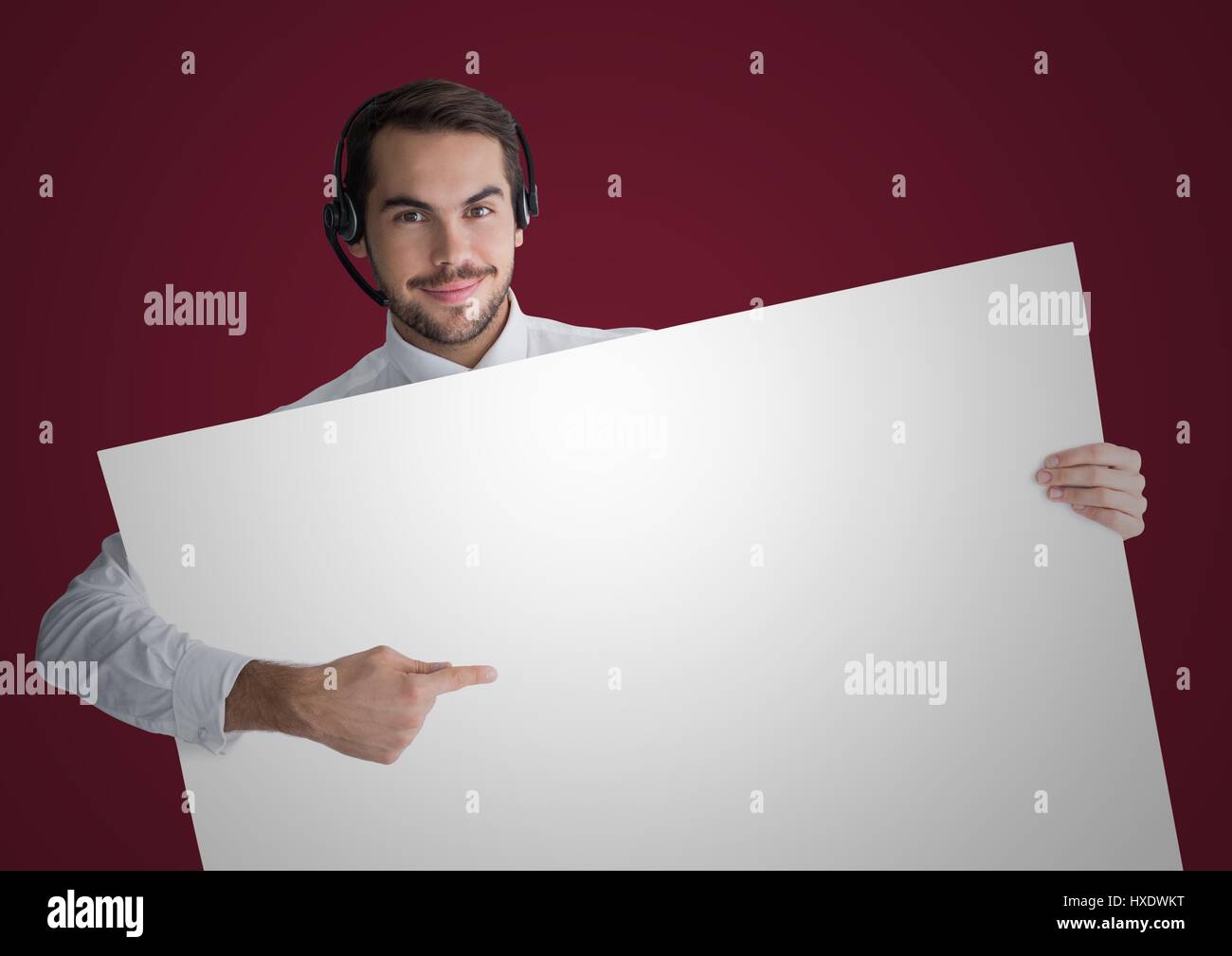 Digital composite of Customer service man with large blank card against ...