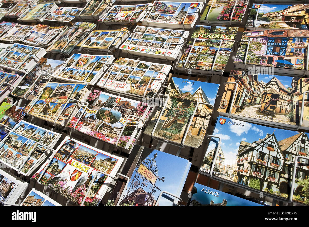 Postcards in a stand before a souvenir business, Postcards in a Rack in ...