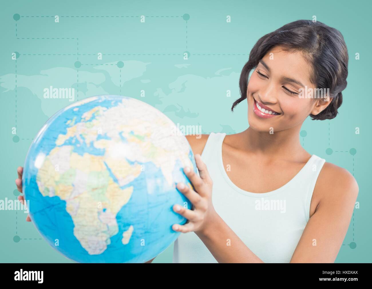 Digital composite of Woman with globe against green map Stock Photo - Alamy