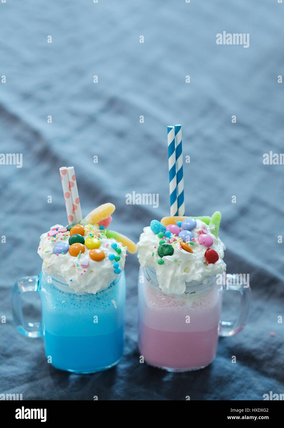 Glass pink milkshake decorated candy hi-res stock photography and ...