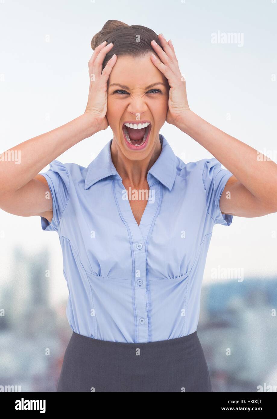 Digital composite of Stressed woman screaming in front of city ...