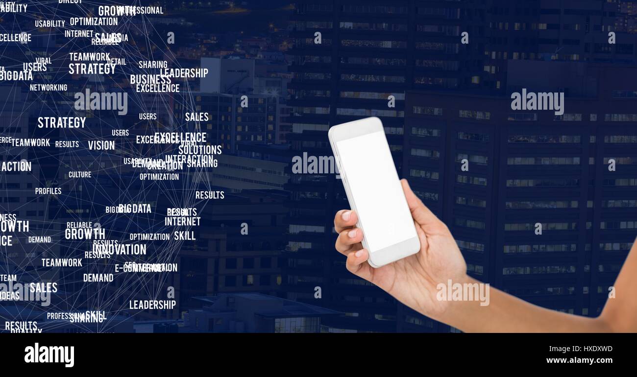 Digital composite of Hand holding phone against Night city with ...