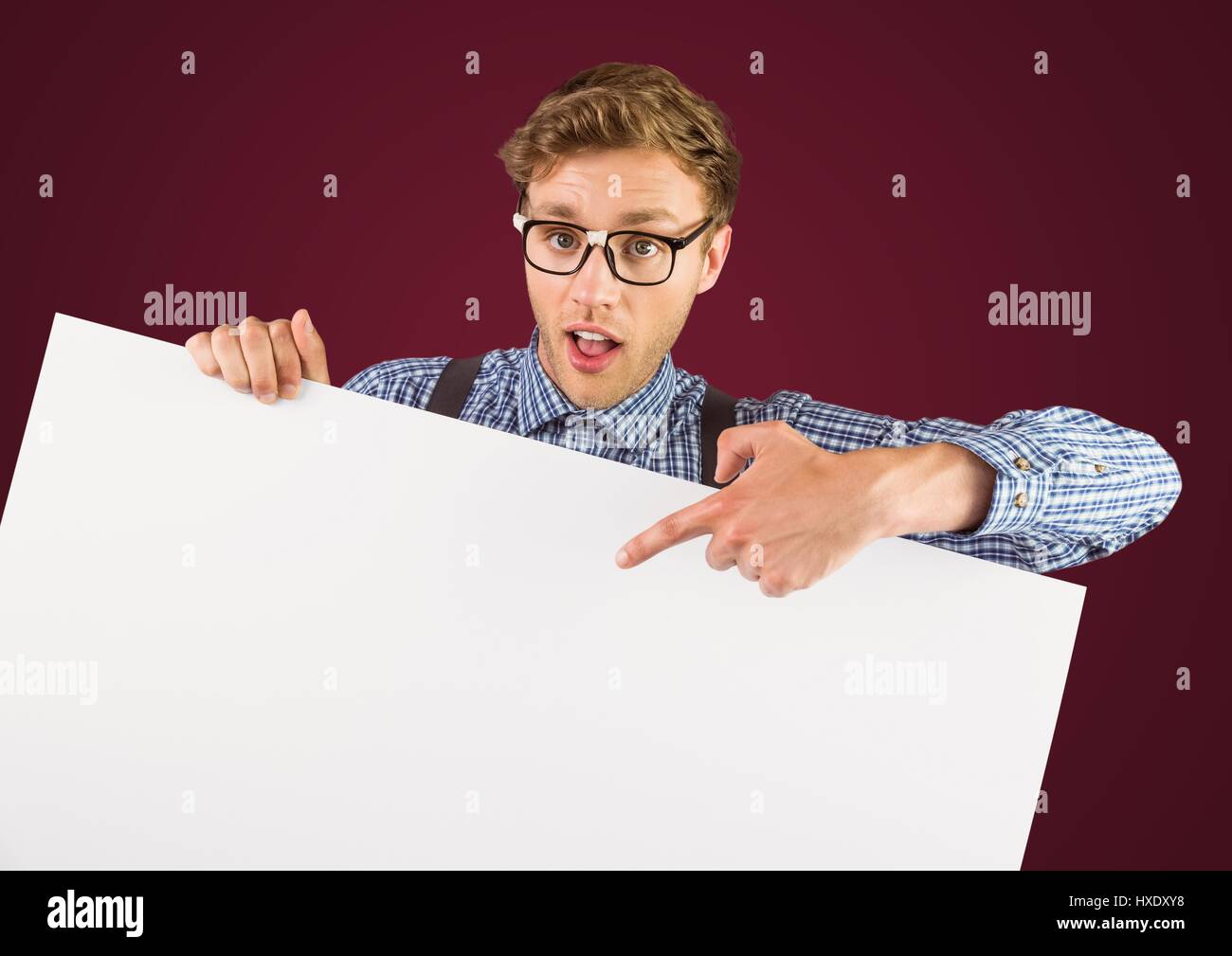 Digital composite of Nerd with large blank card against maroon ...