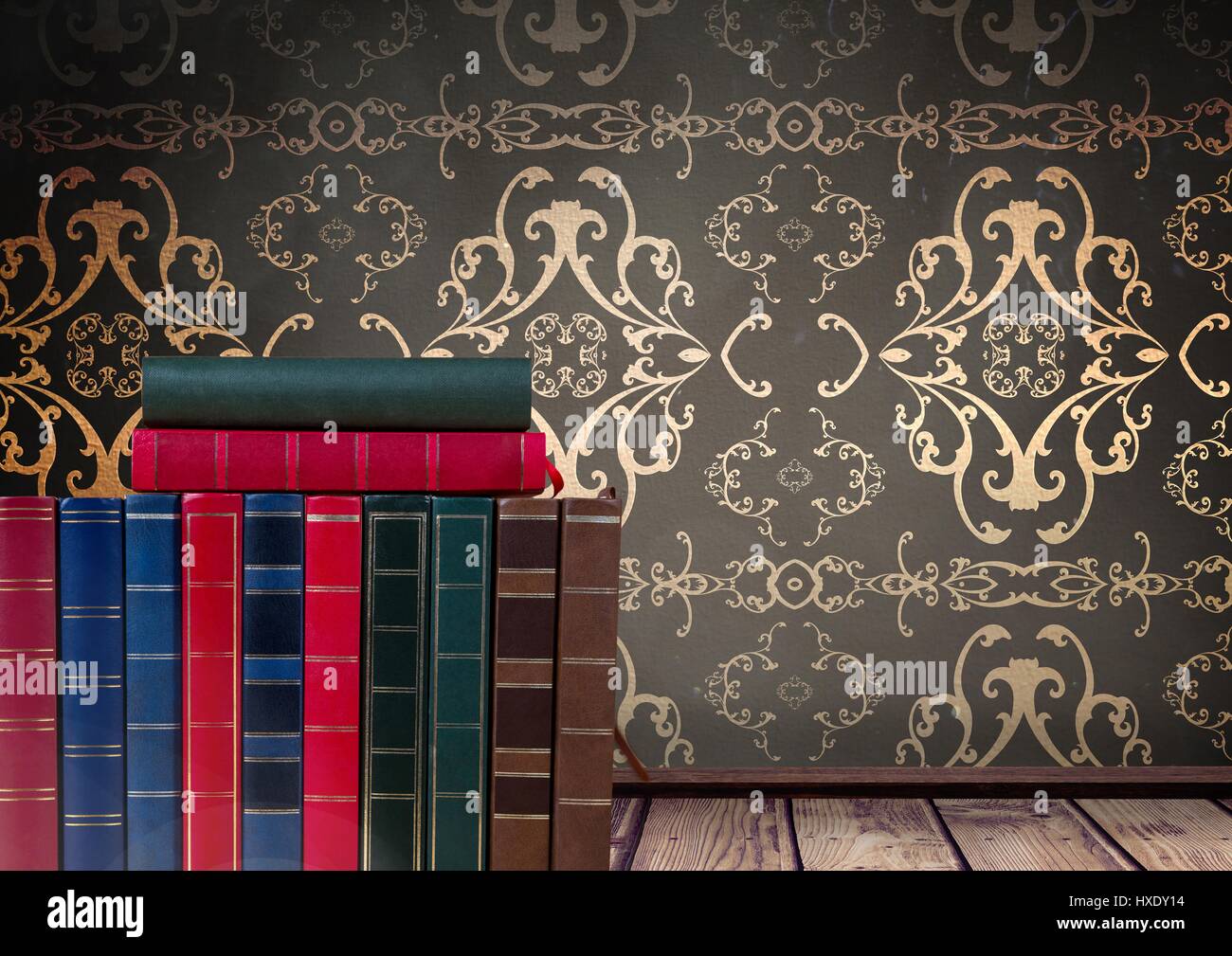 Digital composite of Books stacked by wallpaper antique decorative ...