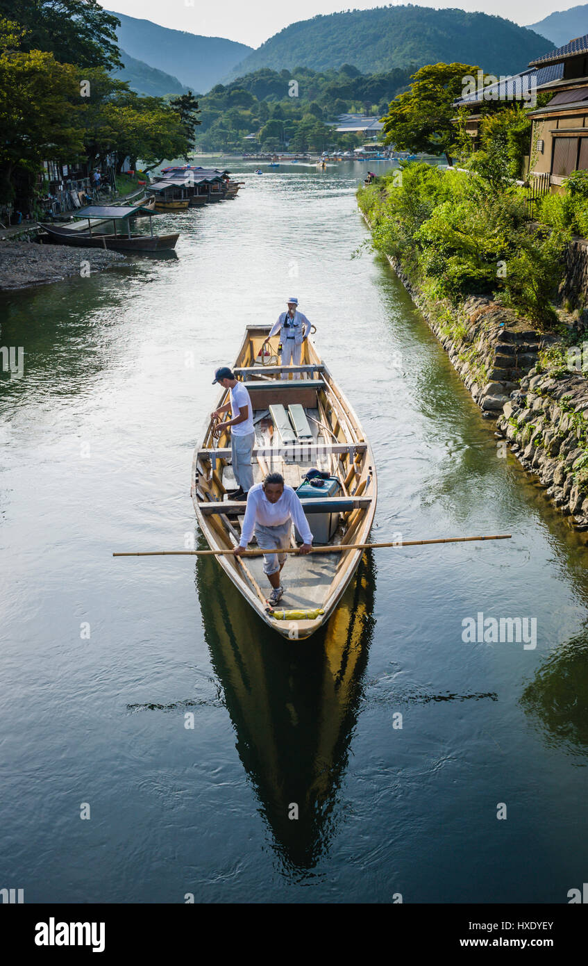 Boatmen working on the Oi River in Arashiyama, Japan Stock Photo - Alamy