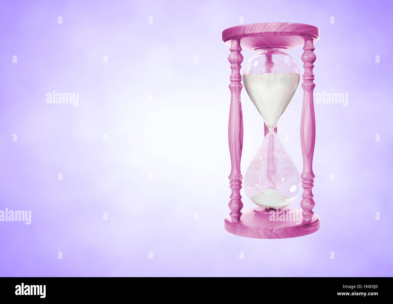 Digital composite of Pink Egg Timer with sand against purple background ...