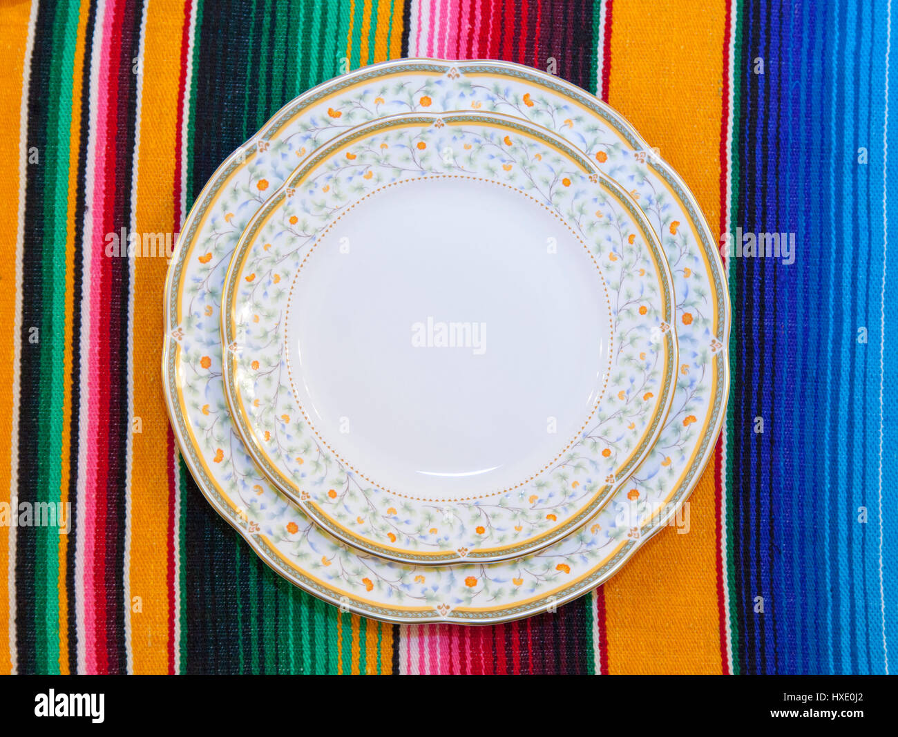 The close view of plates on a traditional Mexican tablecoth Stock Photo ...