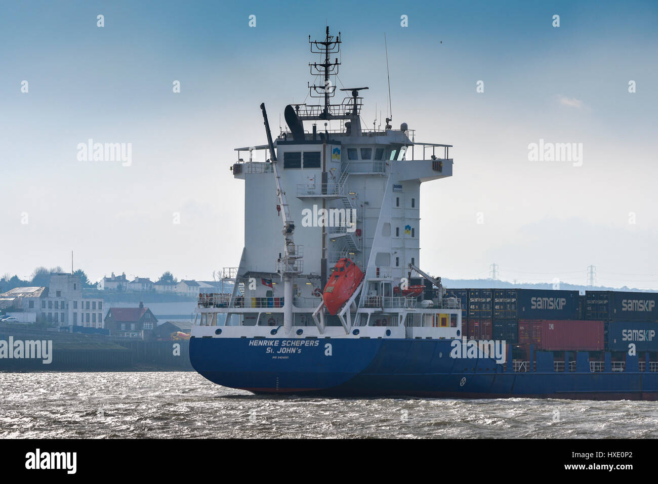 The container ship Henrike Schepers steaming upriver on the River ...