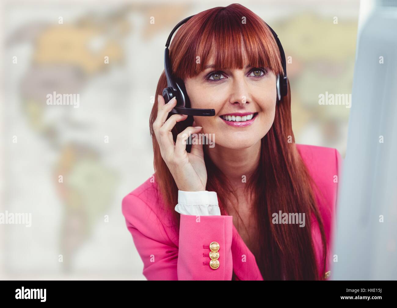 Digital composite of Travel agent at computer against blurry map Stock ...