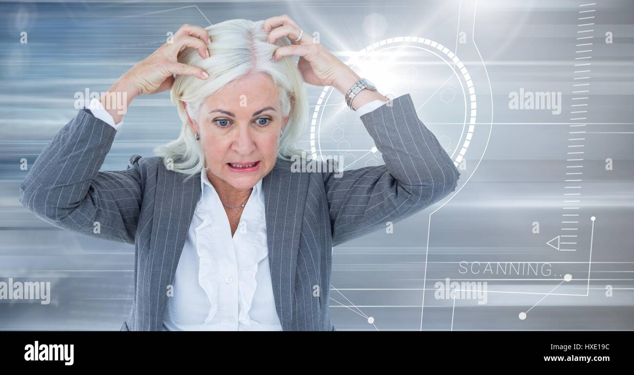 Digital composite of Stressed older woman with technology interface ...
