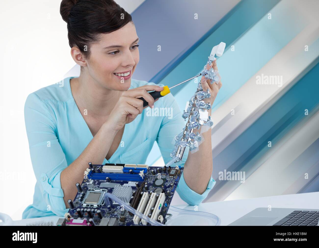Digital composite of Woman with electronics against striped background ...