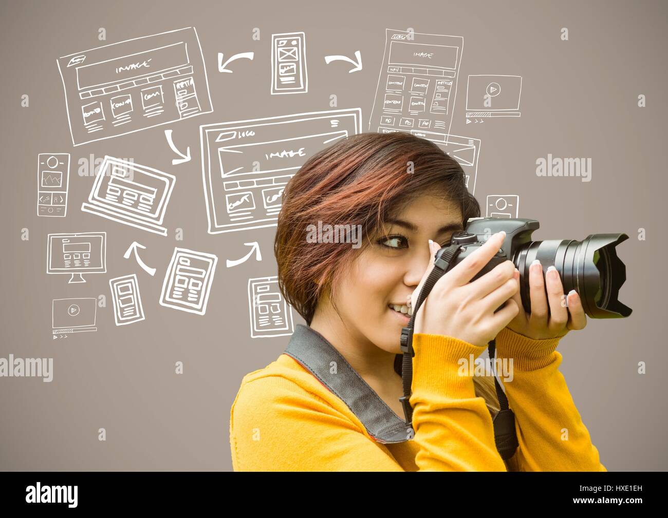 Digital composite of Woman with camera and image computer drawings ...