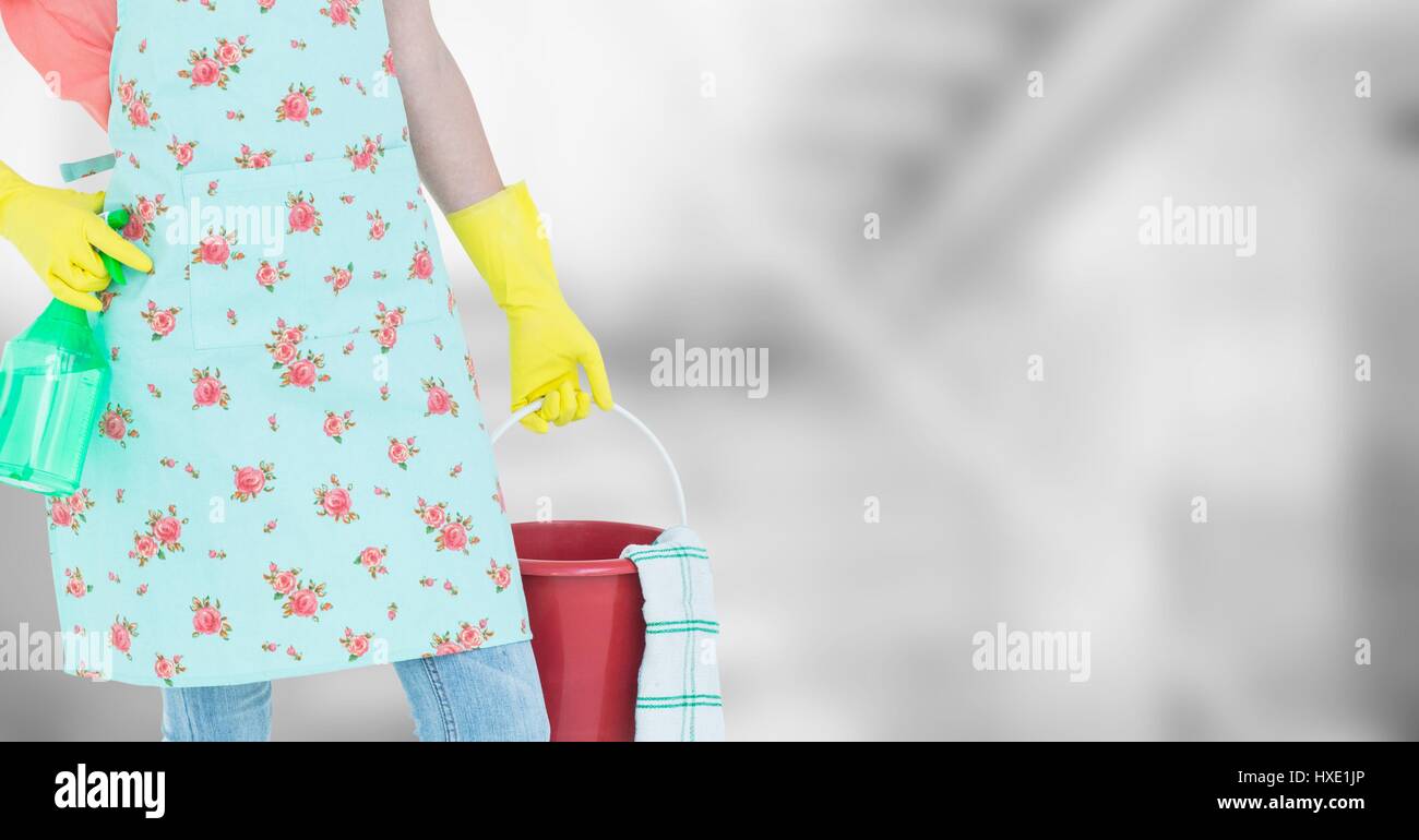 Digital composite of Woman lower body in apron with bucket against ...