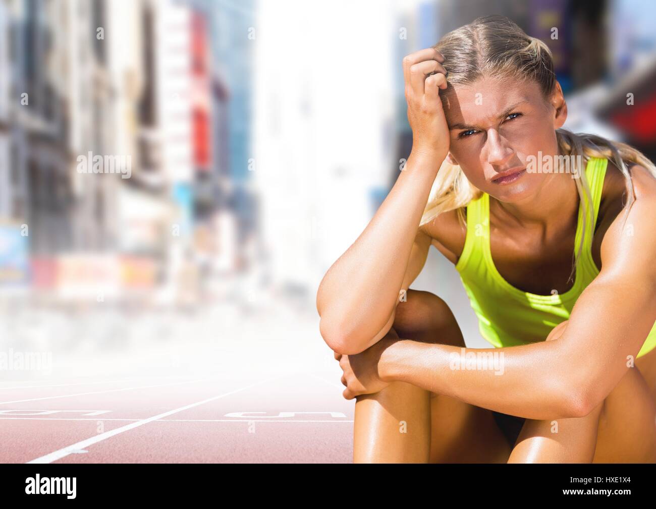 Digital composite of Sad disappointed athlete runner sitting down in ...