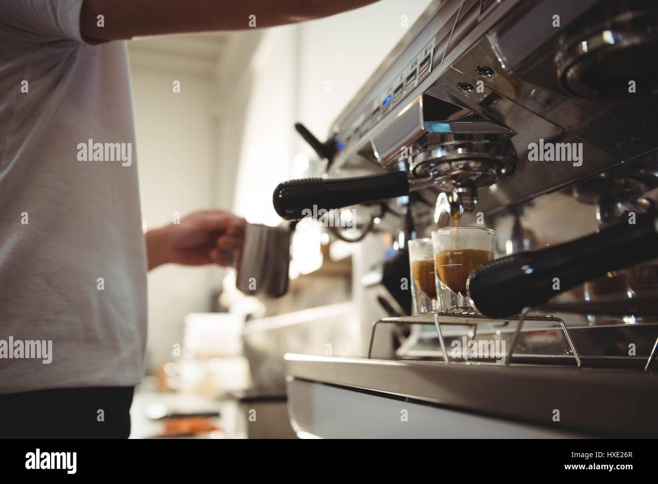 Using coffee machine hi-res stock photography and images - Alamy