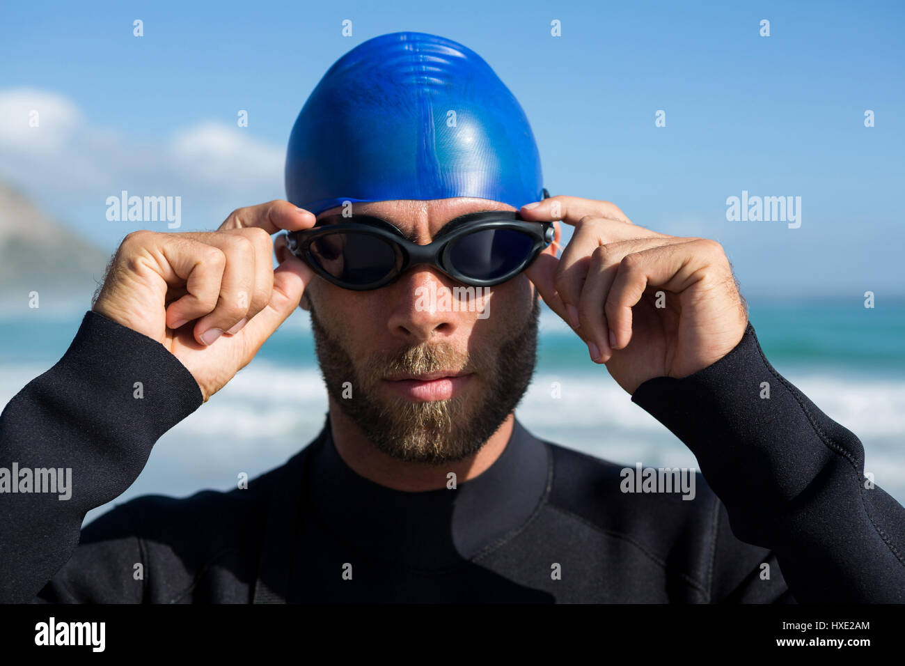 Man wearing swim goggles hi-res stock photography and images - Alamy