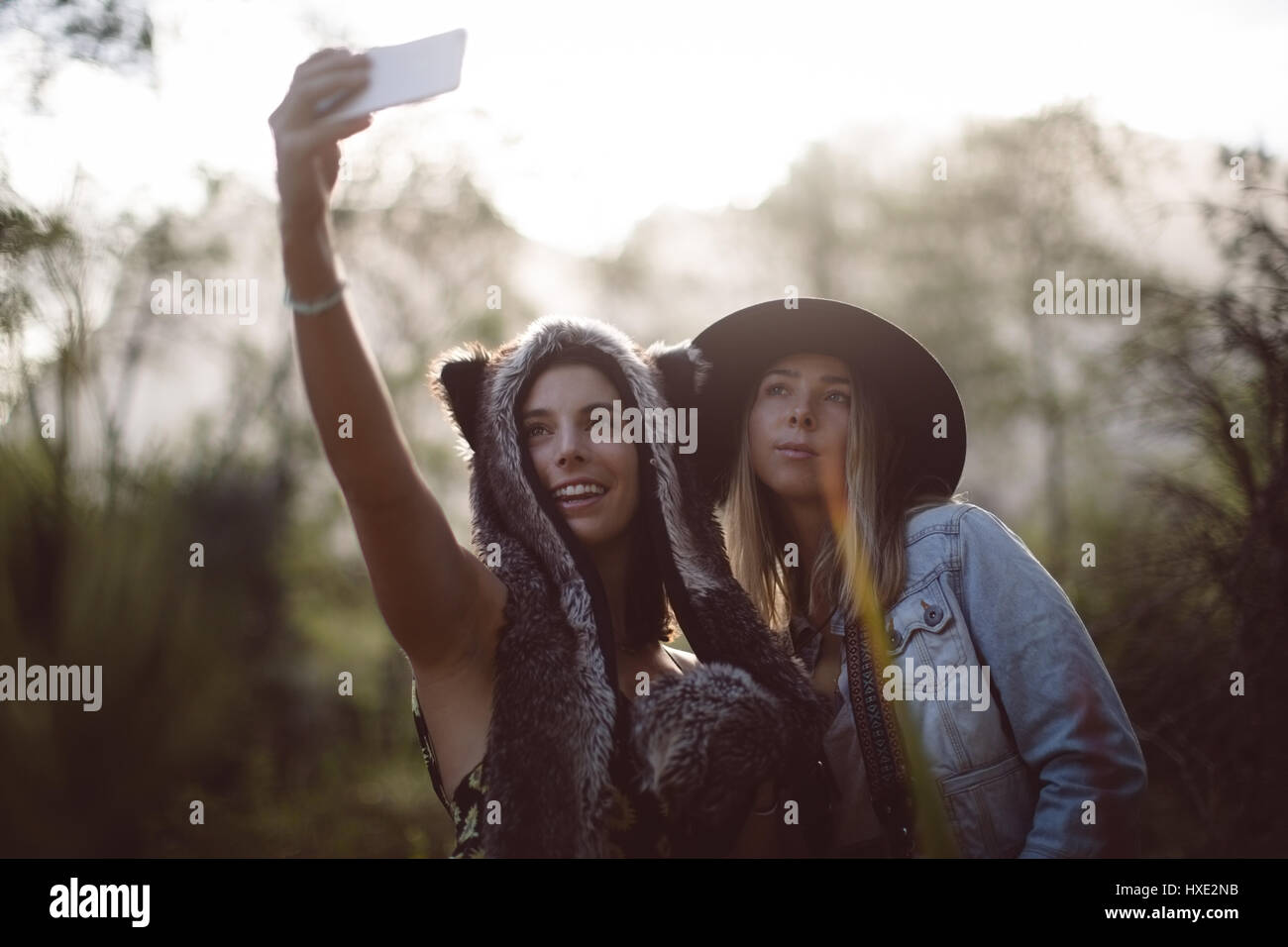Beautiful female friends posing selfie hi-res stock photography and ...