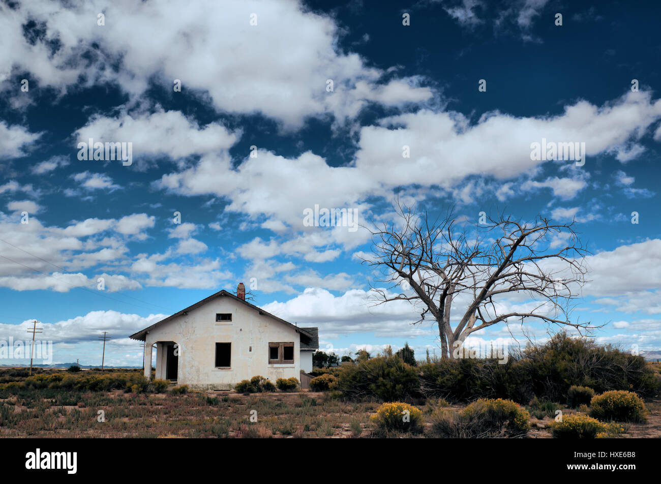 An old, abandoned home stands alone in the small ghost town of Lund ...