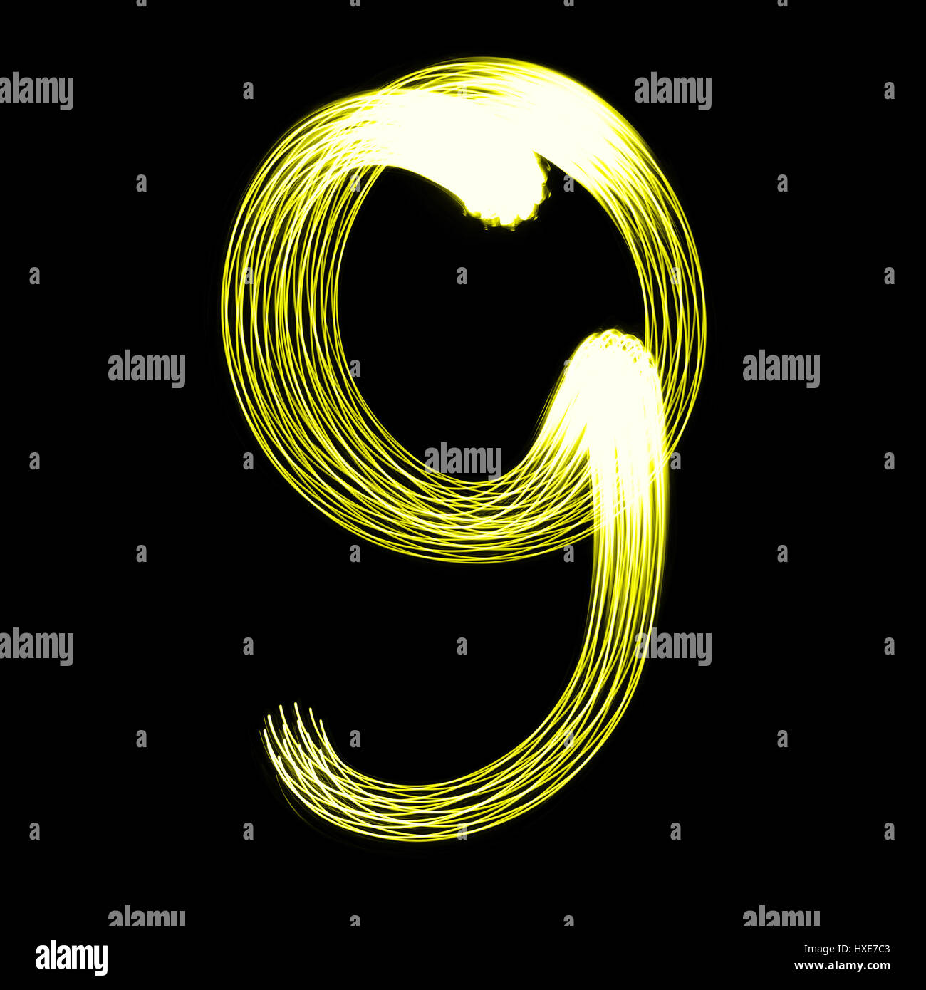 9 - Created by light digits over black background Stock Photo - Alamy