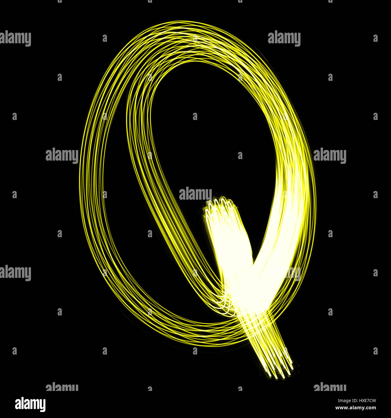 Q - Created by light alphabet over black background Stock Photo - Alamy