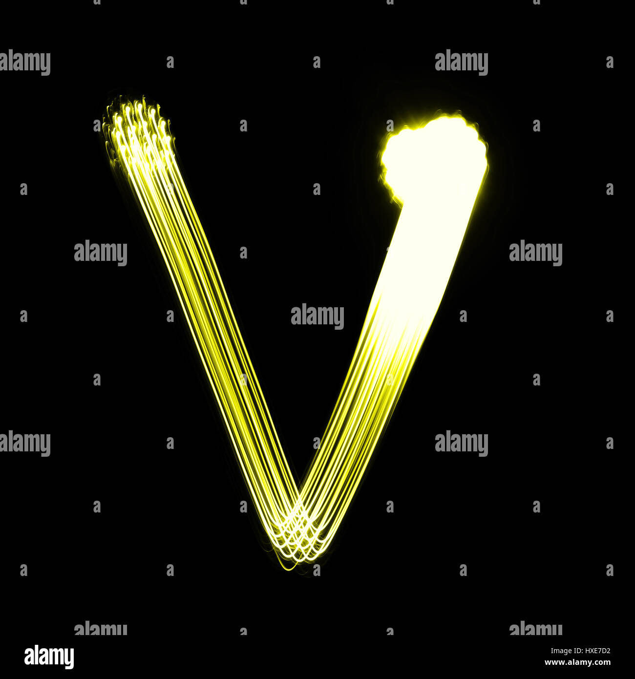 V - Created by light alphabet over black background Stock Photo - Alamy